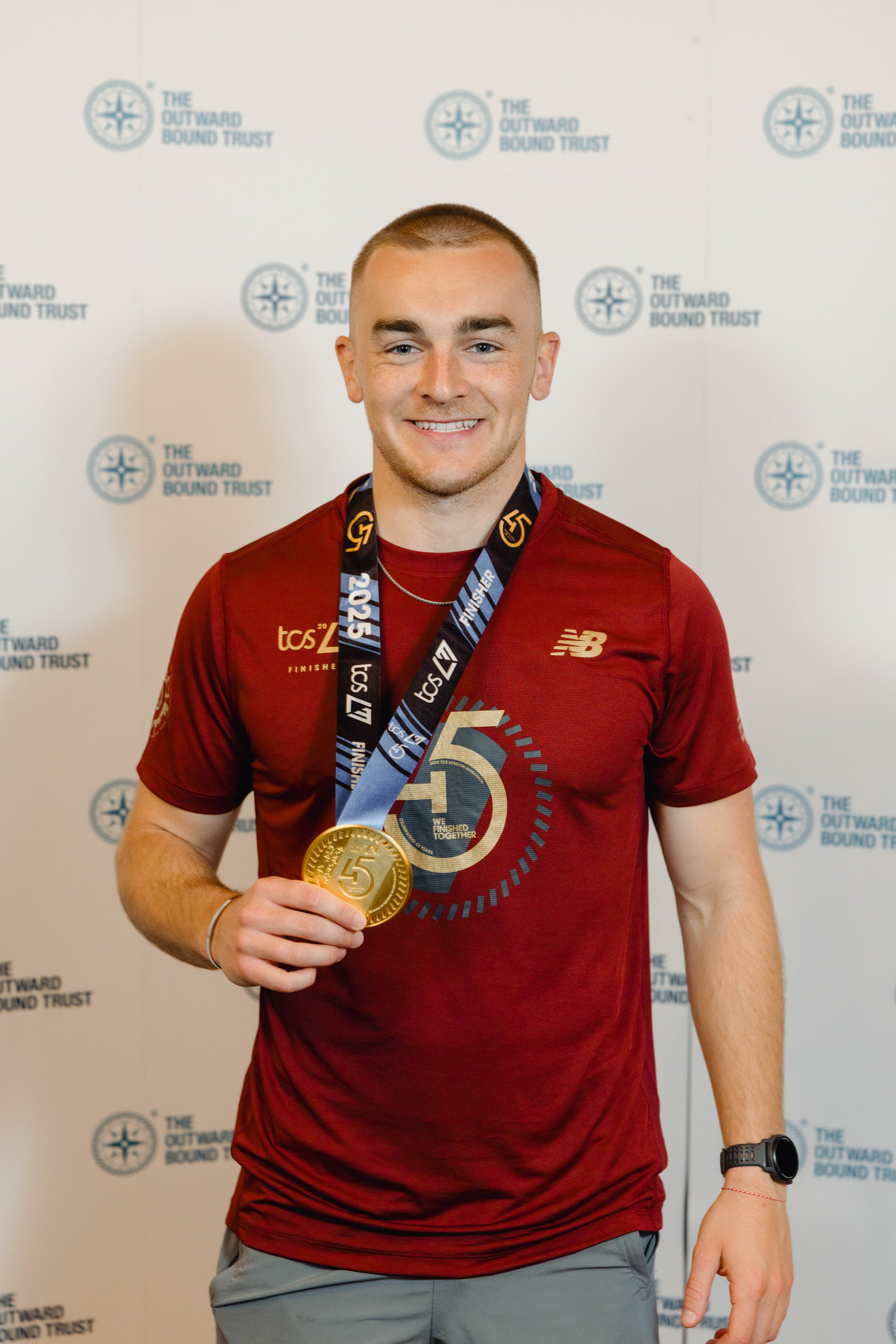 Jacob completes marathon for youth charity